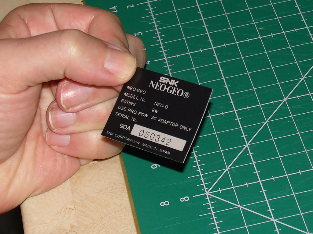 "NEO-GEO AES CONSOLE SYSTEM SERIAL STICKER" (SNK) scanned file at 300 ...