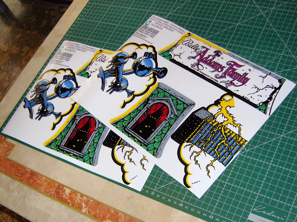 "The Addams Family Pinball Topper Stickers" (BALLY) and "Indiana Jones ...